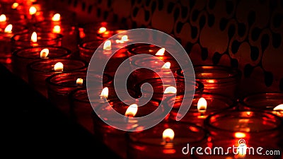 Flames of Burning Red Candles in a Row in a Catholic Church Stock ...
