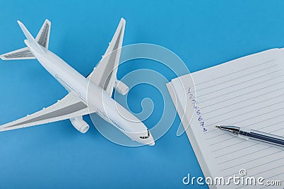 Flight Planning Concept. Plane, Diary And Pen On A Blue Background ...