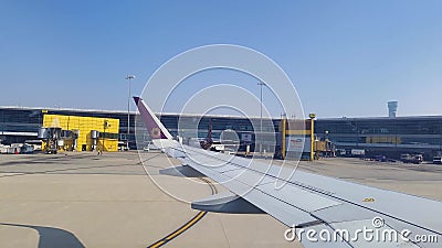 Flight Window View Leaving Terminal for Take Off with Bright Blue Sky ...
