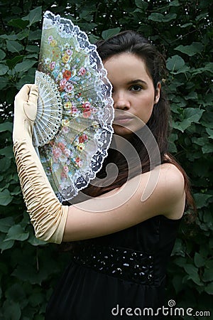 Flirting Girl With A Fan Royalty Free Stock Photography - Image: 10841257