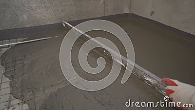 Floor Construction - Human Leveling of Concrete Screed. Leveling the ...