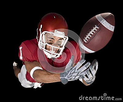 Football Wide Receiver Making a Leaping Catch Stock Image - Image of ...