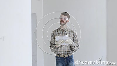 Foreman is Controlling and Assessing Level of Plaster Coating. he is ...