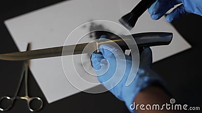 Forensic Scientist Dusting a Knife for Prints Stock Video - Video of ...