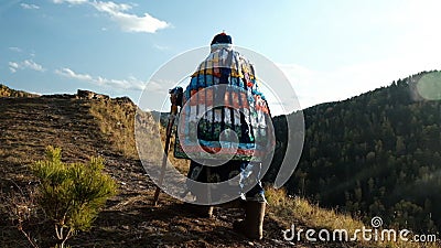 A Forest Wizard in a Traditional Shaman Costume Walks Along a Forest ...