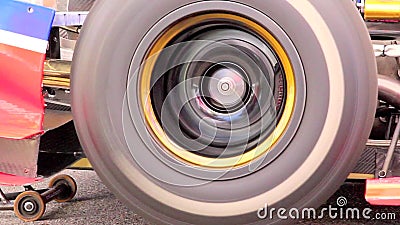 Formula One Car Wheel Spinning while Driver Tests Engine Stock Footage ...