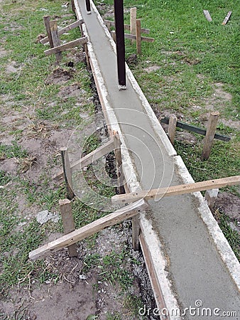 Foundation For Fence Stock Photo - Image: 56505060