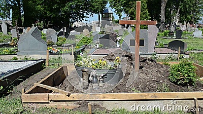 Fresh grave cemetery soil stock footage. Video of memory - 35179383
