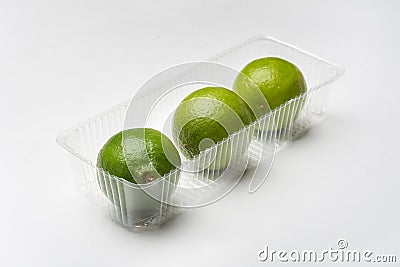 Fresh Limes In Clear Plastic Packaging On A White Background. Stock ...
