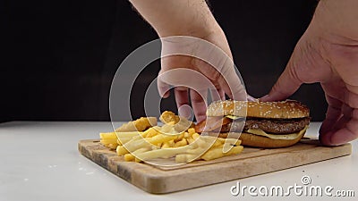 Fried Potato Chips Falling Down on Hamburger, Slow Motion, Fast Food ...