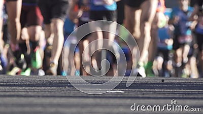Front View of Blurred Runner Legs Running Marathon with Public Voices ...
