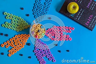 Froot Loops On Blue Table In Pattern, Blue, Pink, Yellow And Purple ...