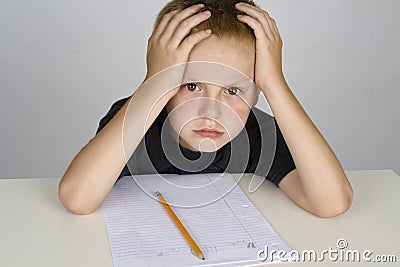Frustrated Little Boy Doing Homework Royalty-Free Stock Image ...