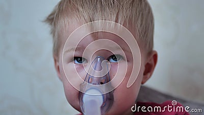 Funny Boy Breathing through an Inhaler Mask. Stock Footage - Video of ...