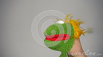 Funny green puppet walking stock footage. Video of concept - 84792130
