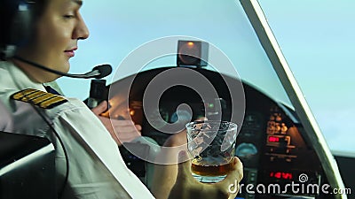 Funny Pilot Sitting in Plane Cockpit and Refusing Glass of Whiskey ...