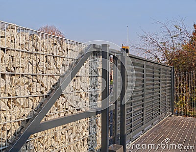 Gabion. Automatic Entrance Gate Used In Combination With A Wall Made Of ...