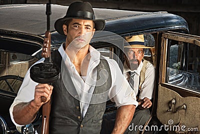 Gangster With Machine Gun And Partner Stock Photo - Image: 36911280