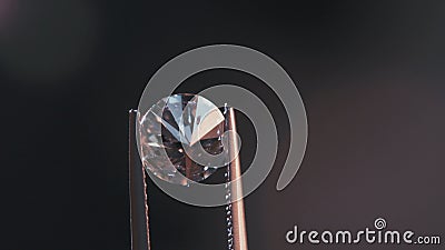 A Gemologist Inspecting a Large Diamond Under a Microscope Stock Video ...