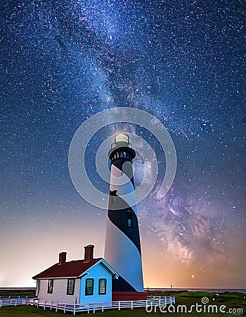 Night Sky Over Lighthouse. The Milkyway Galaxy Rising Up Over The ...