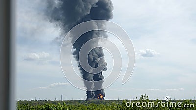 A Giant Fire and a Column of Black Smoke after the Explosion at the Oil ...
