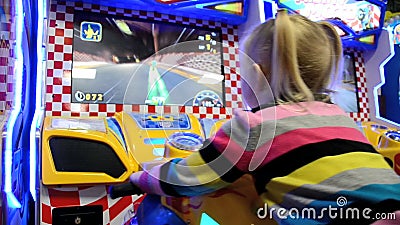 Girl Playing Arcade Game Machine at an Amusement Park Stock Video ...