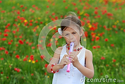 Girl Playing The Recorder Royalty Free Stock Images - Image: 14037979