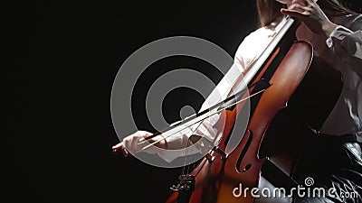 Girl S Hand Playing Cello, Closeup on Black Background. Cello Strings ...
