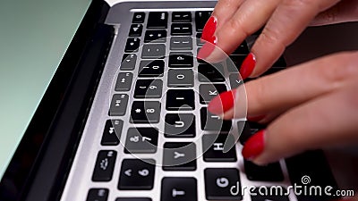 The Girl is Typing on the Keyboard of a Laptop Computer. Side View of ...