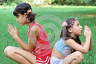 Girls In Prayer Stock Photo | CartoonDealer.com #3040628