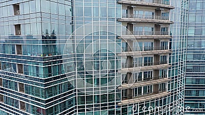 The Glass Facade of a Skyscraper with a Mirror Reflection of Sky ...