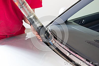 Glazier Using Application Gun To Apply Adhesive For Windscreen Stock ...