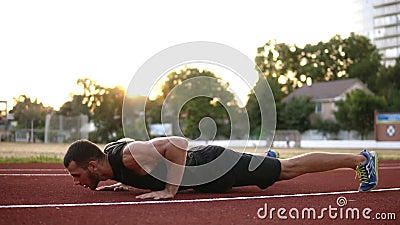 Gorgeous Slow Motion Footage of a Muscular Man Workout Outdoors. Doing ...