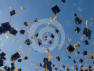 Graduation Caps Soaring Into The Clear Blue Sky, Symbolizing Years Of ...