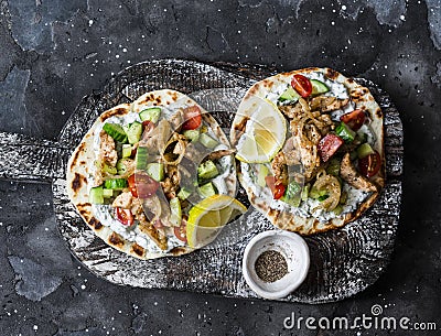 Greek Chicken Gyros Flatbread On A Rustic Cutting Board On A Dark ...
