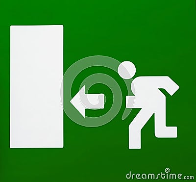 Green Emergency Exit Sign With The Silhouettes Of Directional Arrow And ...
