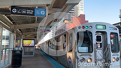 Green Line CTA Train Approaching on the Tracks at the Clinton Station ...