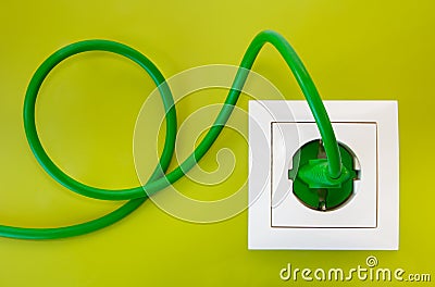 Green Power Plug Into White Power Socket Stock Photo | CartoonDealer ...