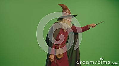 Green Screen. an Old Wizard Makes Wishes with a Magic Wand. Stock ...