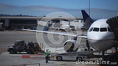 Ground Crew Working on Unloading an Airplane Stock Footage - Video of ...