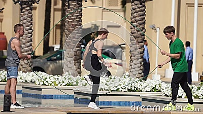 Group of Acrobats Jumping with Double Jump Rope in Dubai Doing ...