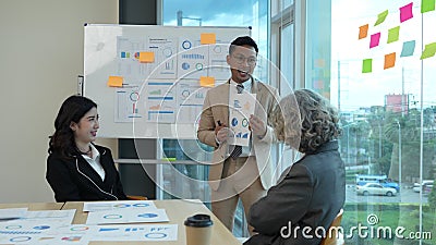 Group of Business People at Meeting Watching Presentation of Reports in ...