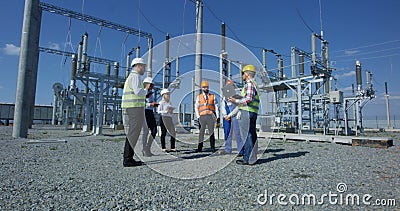 A Group Of Electrical Workers Stock Video - Video of power, equipment ...