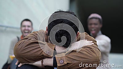 A Group of Students Harass a Young Student at the University Stock ...