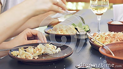 Group of Young People Eating Pasta . Stock Video - Video of hands, herb ...