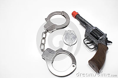 Gun, Handcuffs And Badge Stock Photos - Image: 2333583