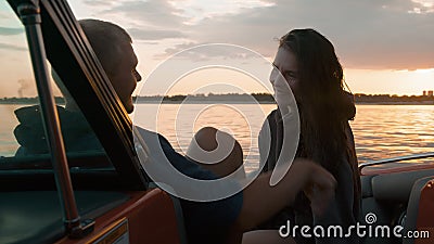 A Guy and a Girl Cuddle Cute at Sunset Sitting in a Boat Stock Footage ...
