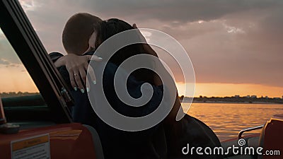 A Guy and a Girl Cuddle Cute at Sunset Sitting in a Boat Stock Video ...