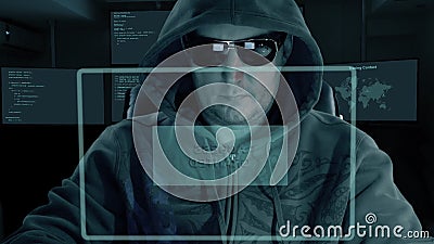 Hacker in Hood and Dark Glasses Sits in Front of Virtual Screen and ...