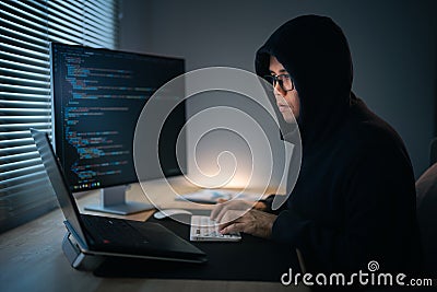 Hacker Man Wearing Hood Writing Code To Hack Network Security System ...